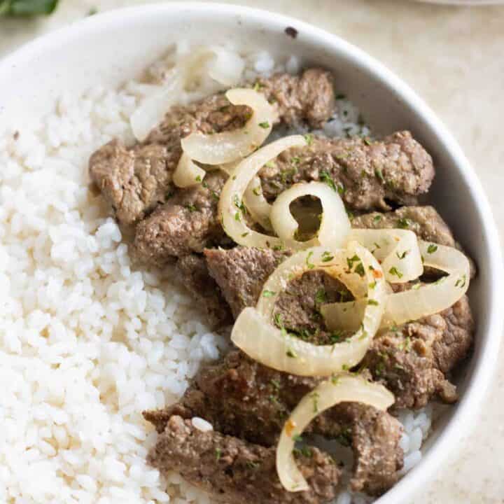 Bistec Encebollado (Puerto Rican cubed steak & Onions) - Food Metamorphosis